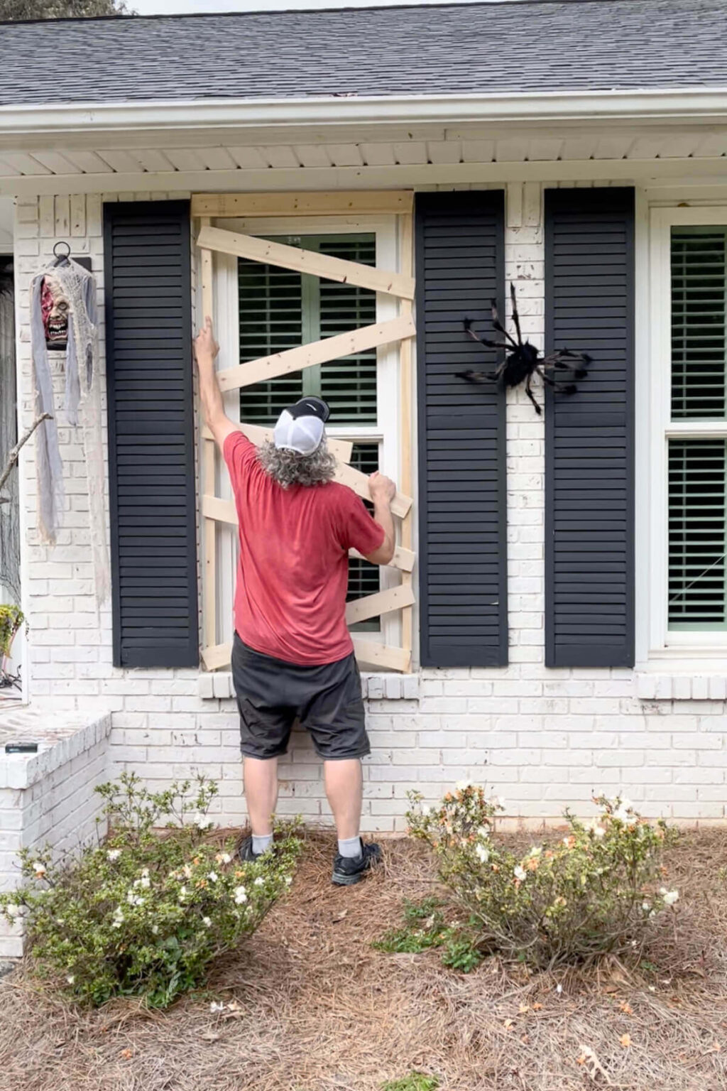 DIY Halloween Decorations: Spooky Boarded Up Windows
